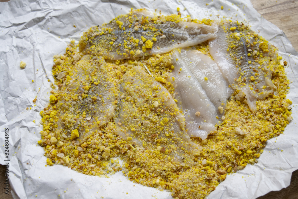 plaice fillets just breaded Stock Photo | Adobe Stock