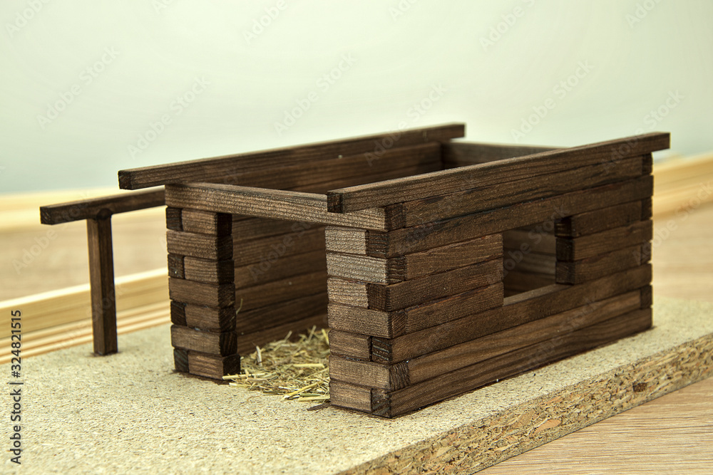 Foto de Miniature model of farm building, unfinished. Modellers needs ...