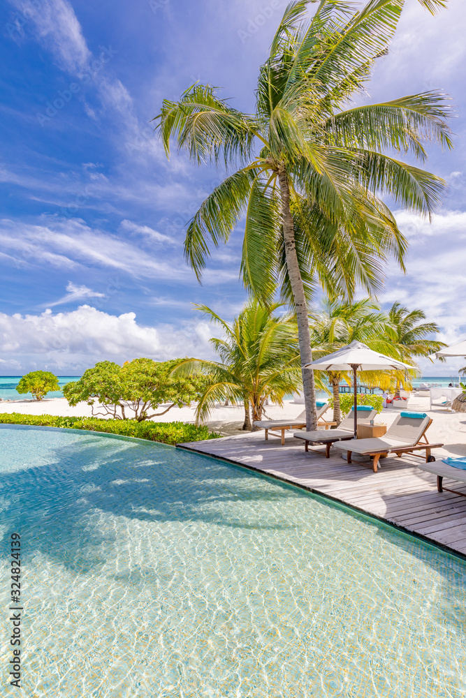 Summer beach vacation pool. Chaise lounge concept, luxury travel ...