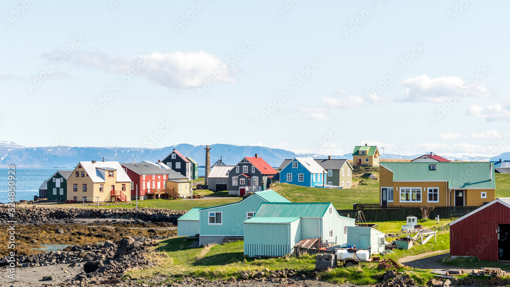 Colorful buildings and the charming city of Flatey Island in Iceland ...