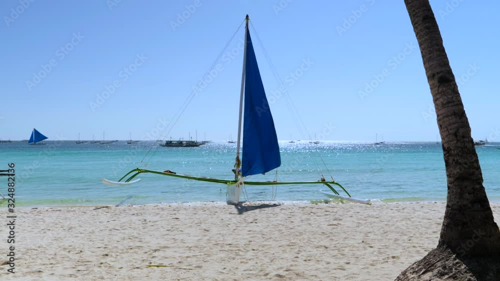 Slow motion of traditional paraw sailing boat from native Visayas is ...