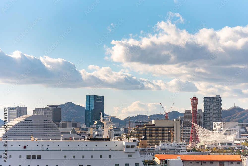 Port of Kobe city skyline view in sun set time with clear blue sky ...