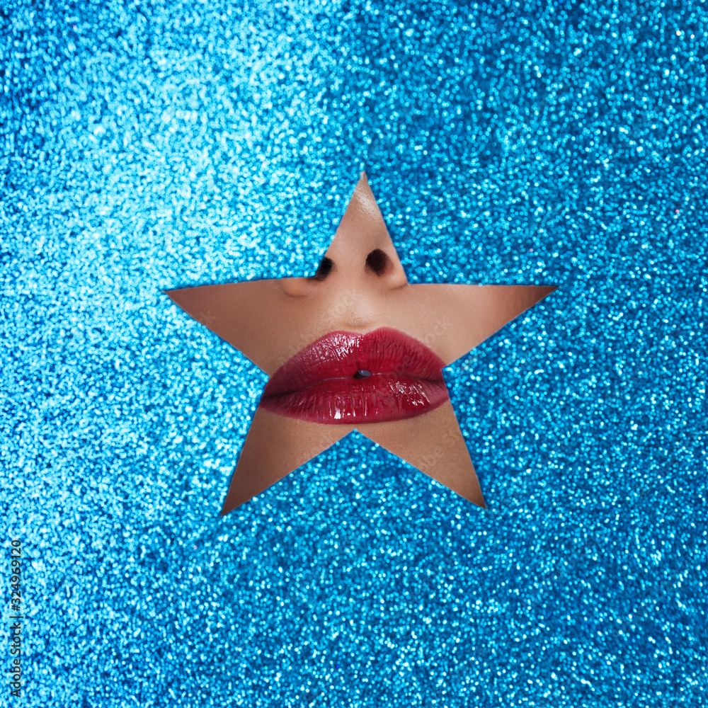 Sexy female lips in a star-shaped cutout. Stock Photo | Adobe Stock