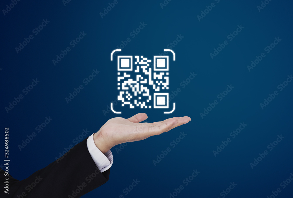 Hand holding QR code on hand. QR code scanning payment and verification ...