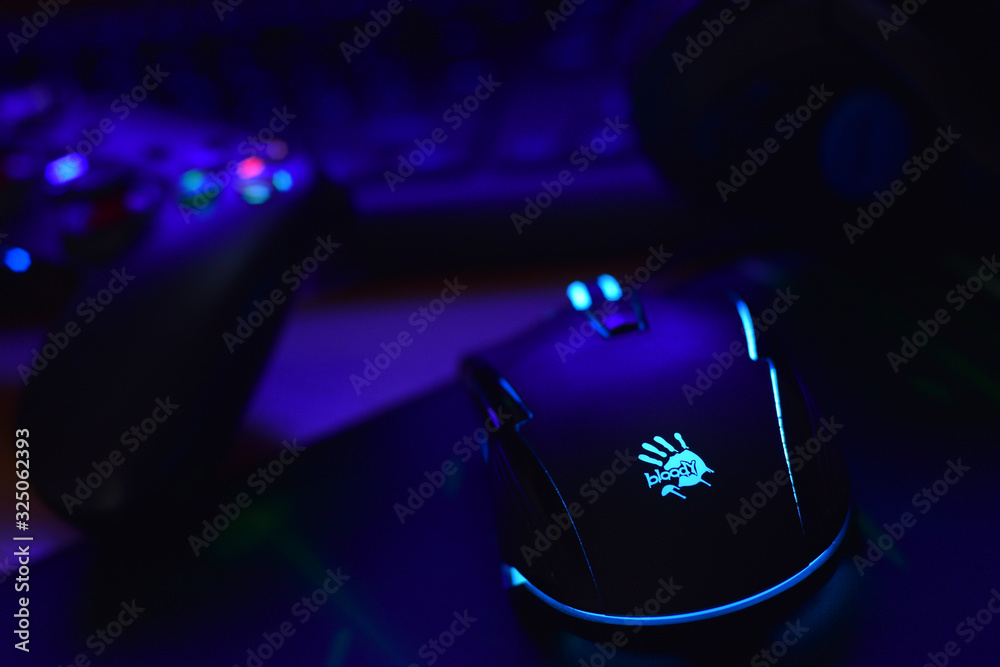 Gamesir g3s video game controller and Bloody p93 gaming mouse on office ...