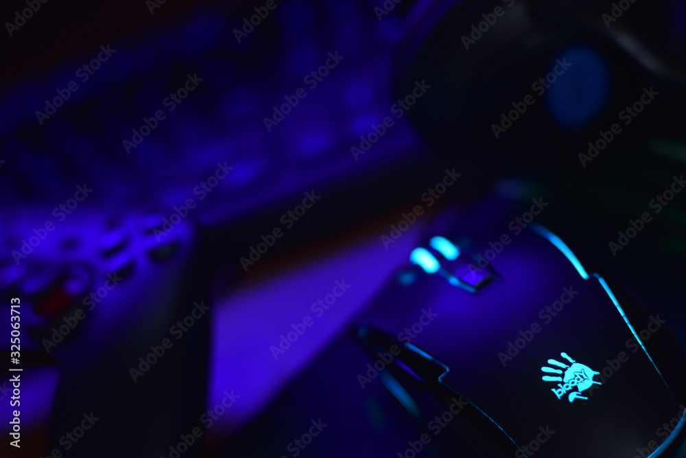 Gamesir g3s video game controller and Bloody p93 gaming mouse on office ...