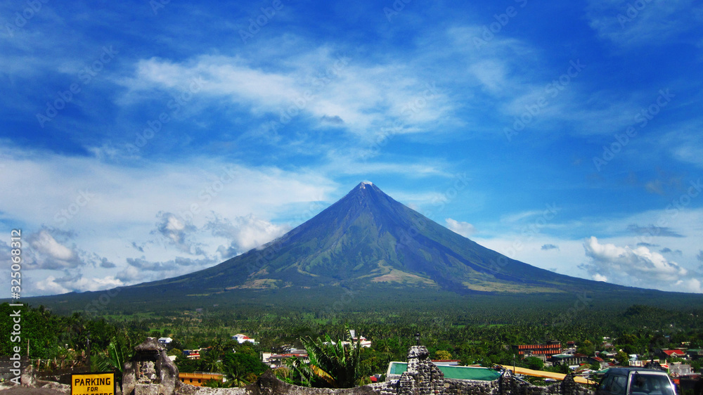 Mayon Volcano or Mt. Mayon is a sacred and active stratovolcano ...