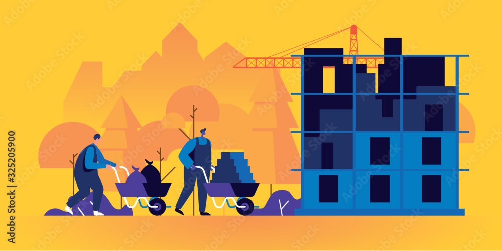 Builders working on construction site. Pair of workers using ...