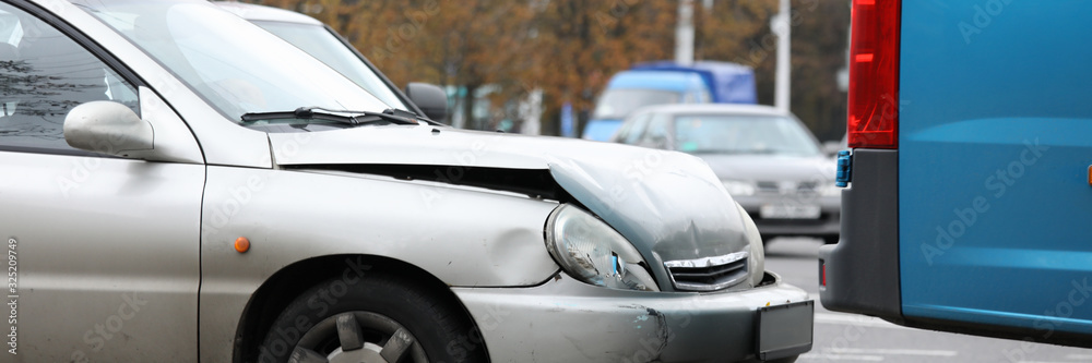 Focus on auto wreck and damaged transport on road. Police inspection ...