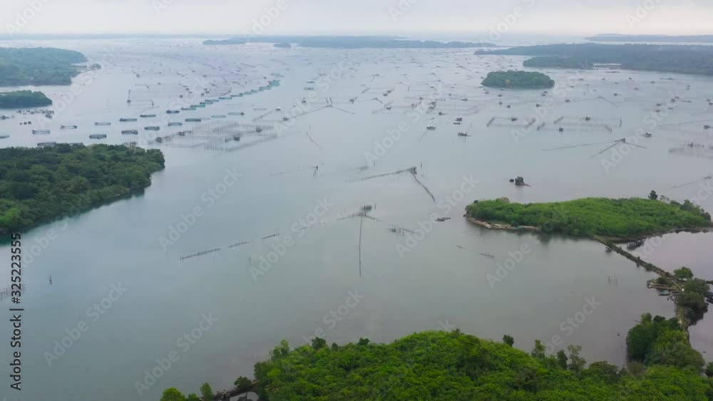 Fish farm with cages for fish and shrimp in the Philippines, Luzon ...