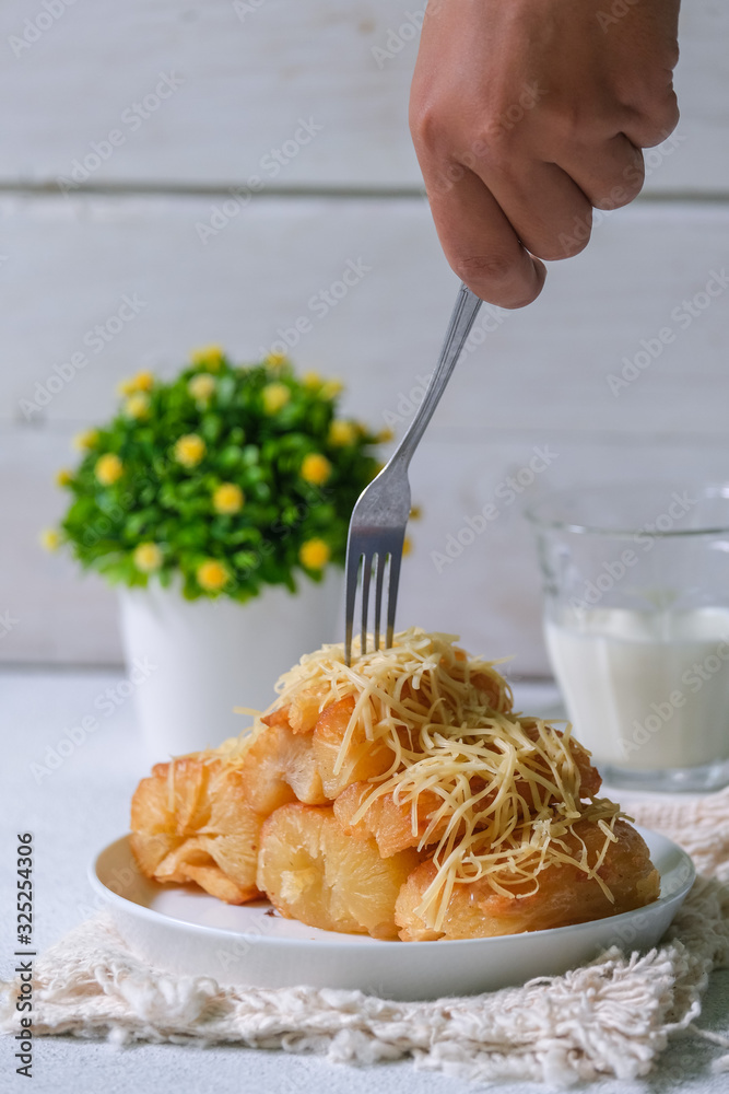 Deep fried cassava root. Brazilian Mandioca Frita (deep fried cassava ...