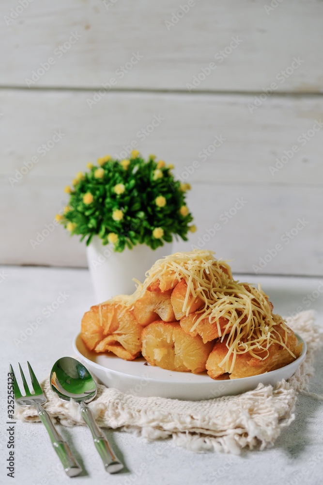 Deep fried cassava root. Brazilian Mandioca Frita (deep fried cassava ...
