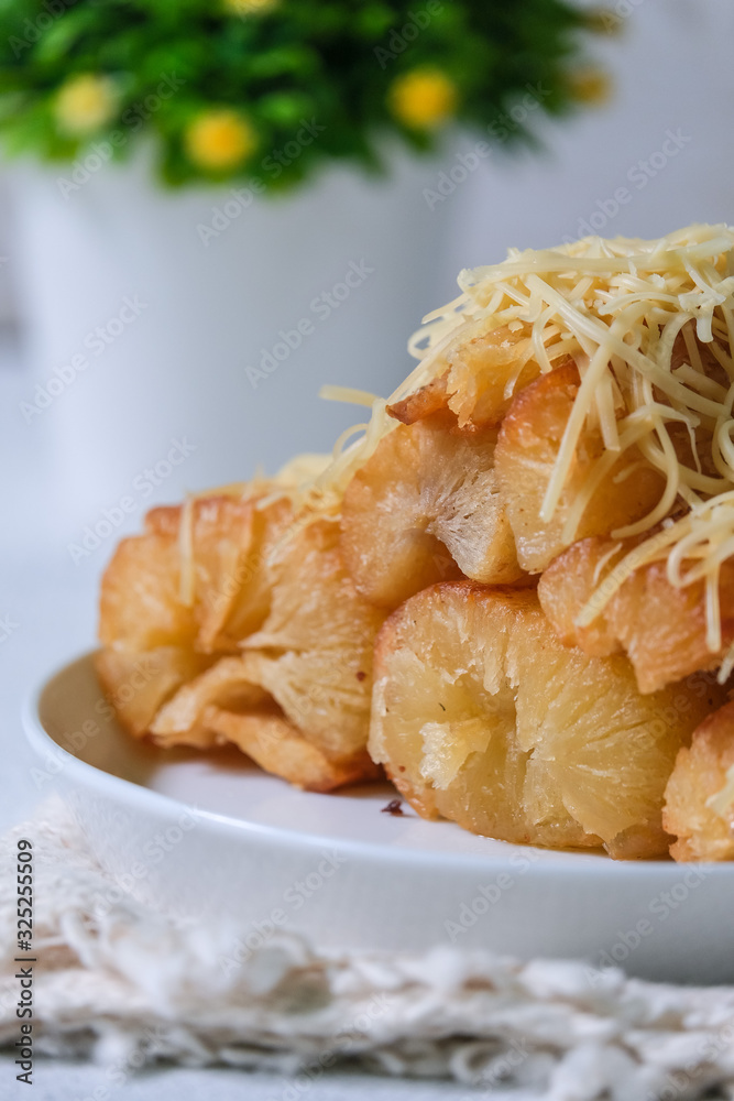 Deep fried cassava root. Brazilian Mandioca Frita (deep fried cassava ...