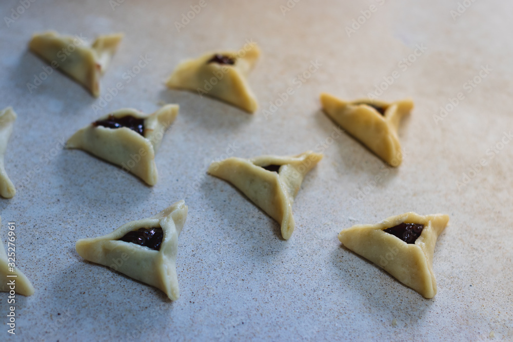 Hamantaschen. (ozenei haman) Triangular pastry made of crispy dough ...
