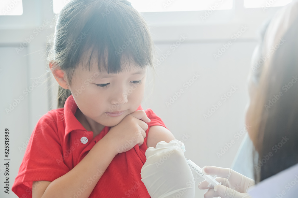 Asian Little child having Injection,Close-up Doctor injecting ...
