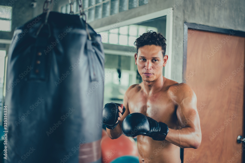 Sport man boxing at fitness gym. Mental health and wellness. Fit and ...