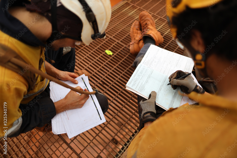 Work safe practise top view of construction worker are wearing white ...