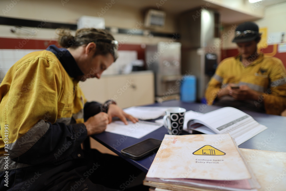Defocused of miner seating on the chair double checking of Job hazard ...