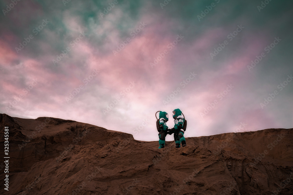 Two Astronauts Wearing Space Suits Holding Hands on Mars/ Red Planet ...