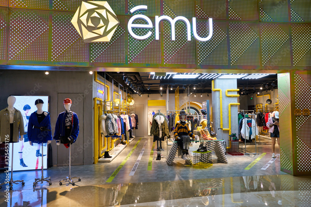 SHENZHEN, CHINA - CIRCA NOVEMBER, 2019: Emu brand name over a store entrance at Wongtee Plaza ...
