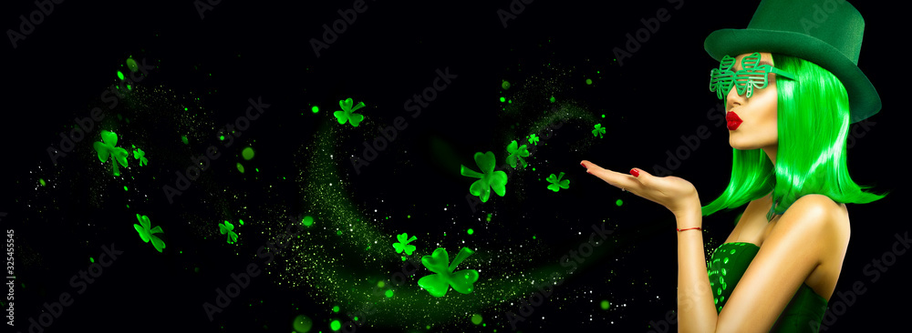 St. Patrick's Day leprechaun model girl pointing hand, holding product ...