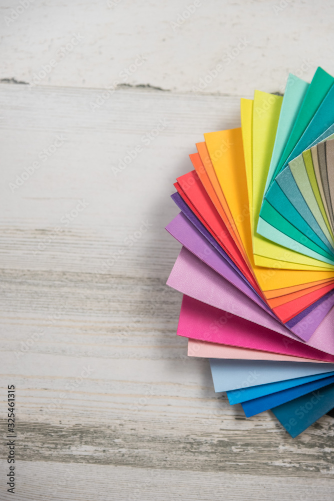 Colorful stack of sample swatches for paint or fabric in spectrum ...