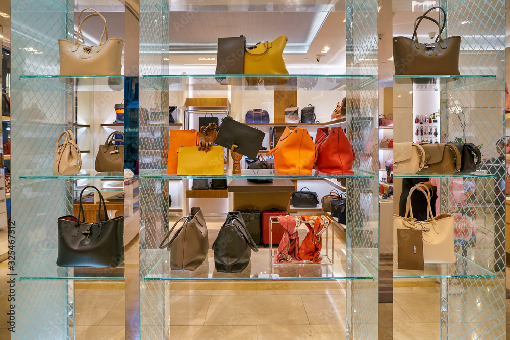 SINGAPORE - CIRCA APRIL, 2019: bags on display at Longchamp store in ...