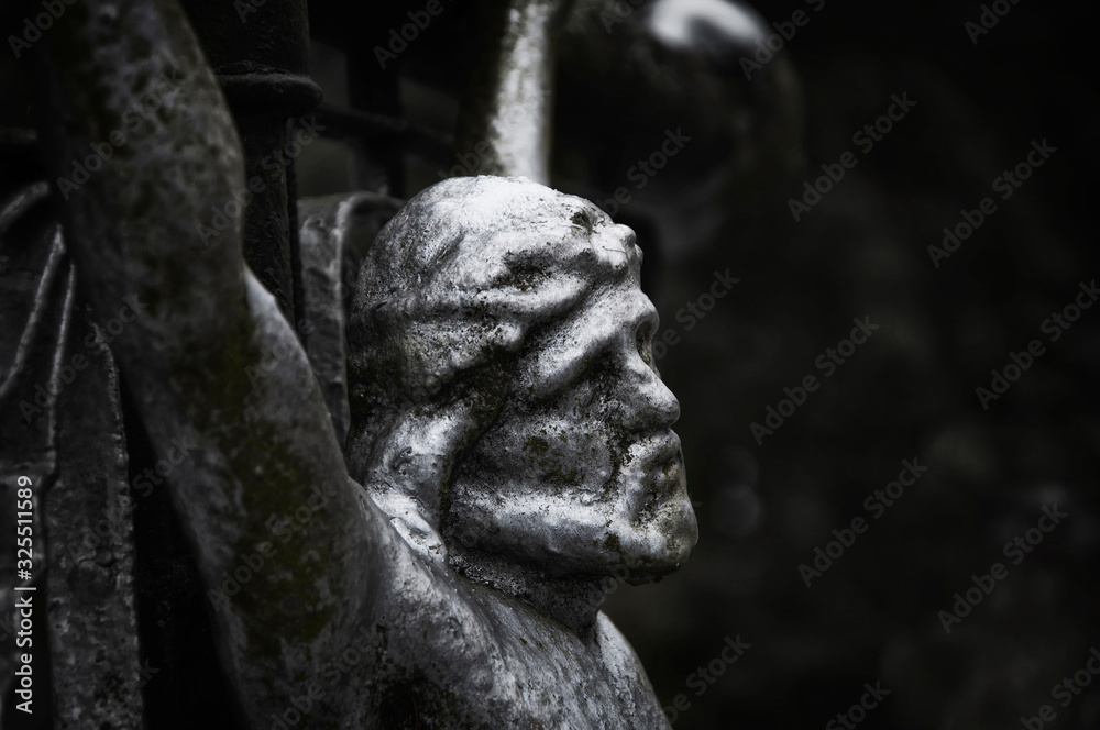 Jesus Christ crucified. An ancient metal sculpture, closeup Stock Photo ...