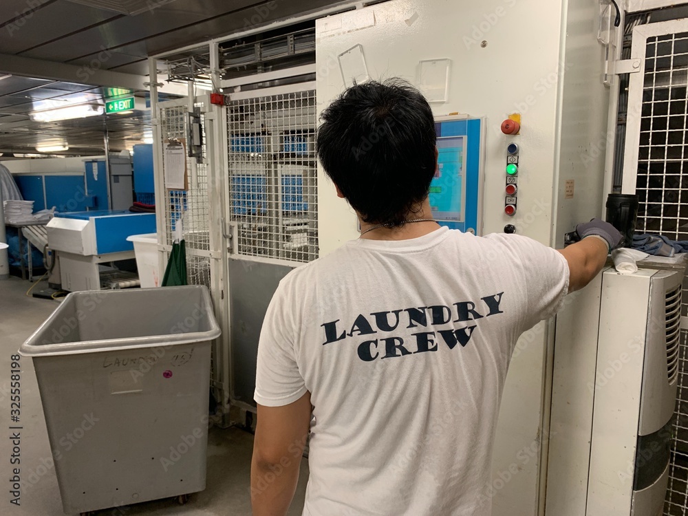 Laundry crew are working on the cruise ship. Huge operation on a luxury ...
