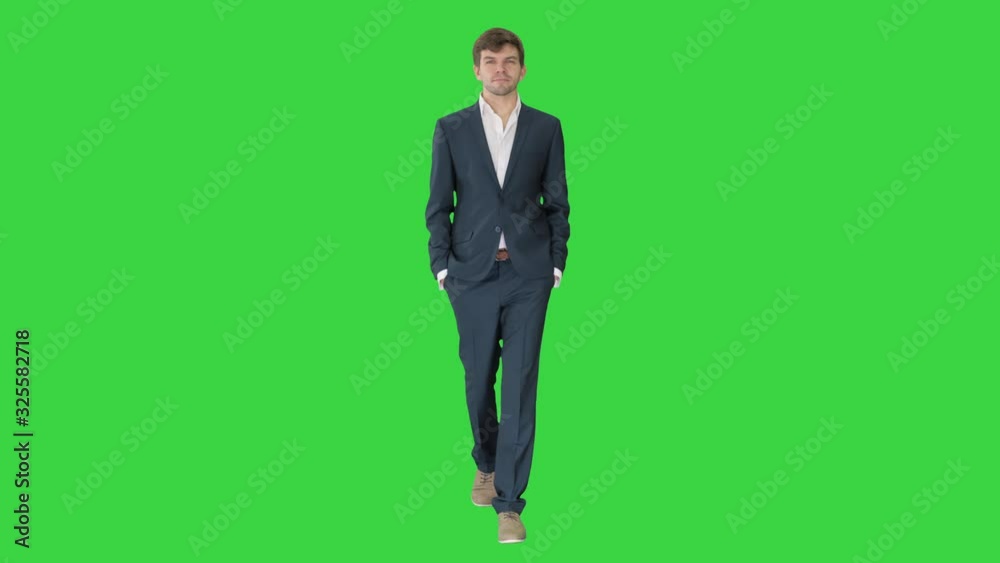 Handsome business man walking forward on a Green Screen, Chroma Key ...