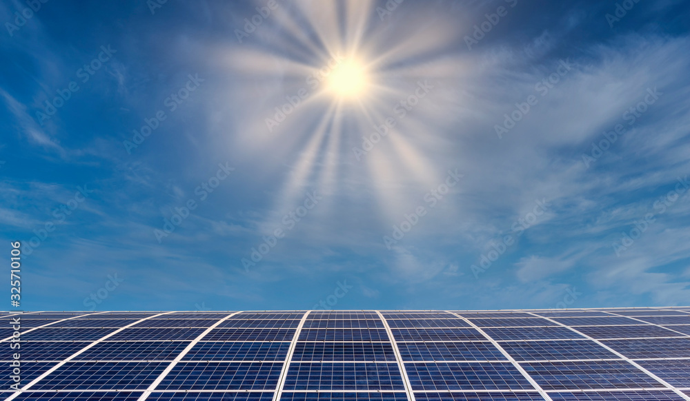 solar panel with sun and blue sky Stock Photo | Adobe Stock
