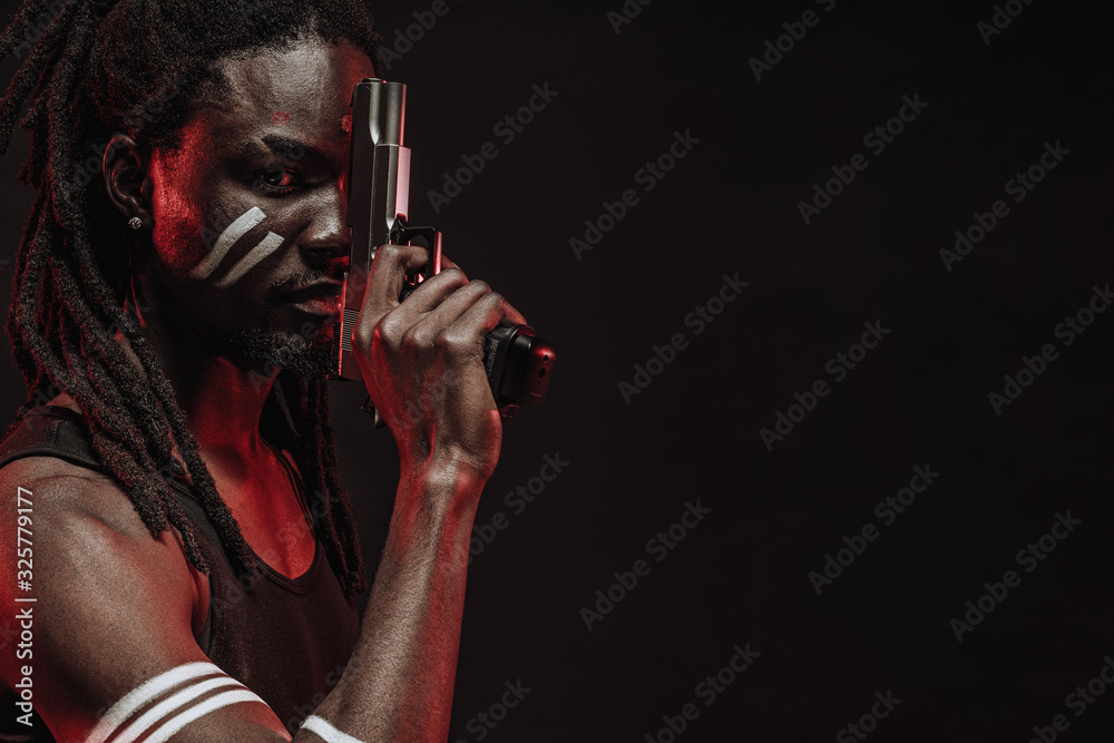 muscular african man isolated over black background. photoshot of real ...