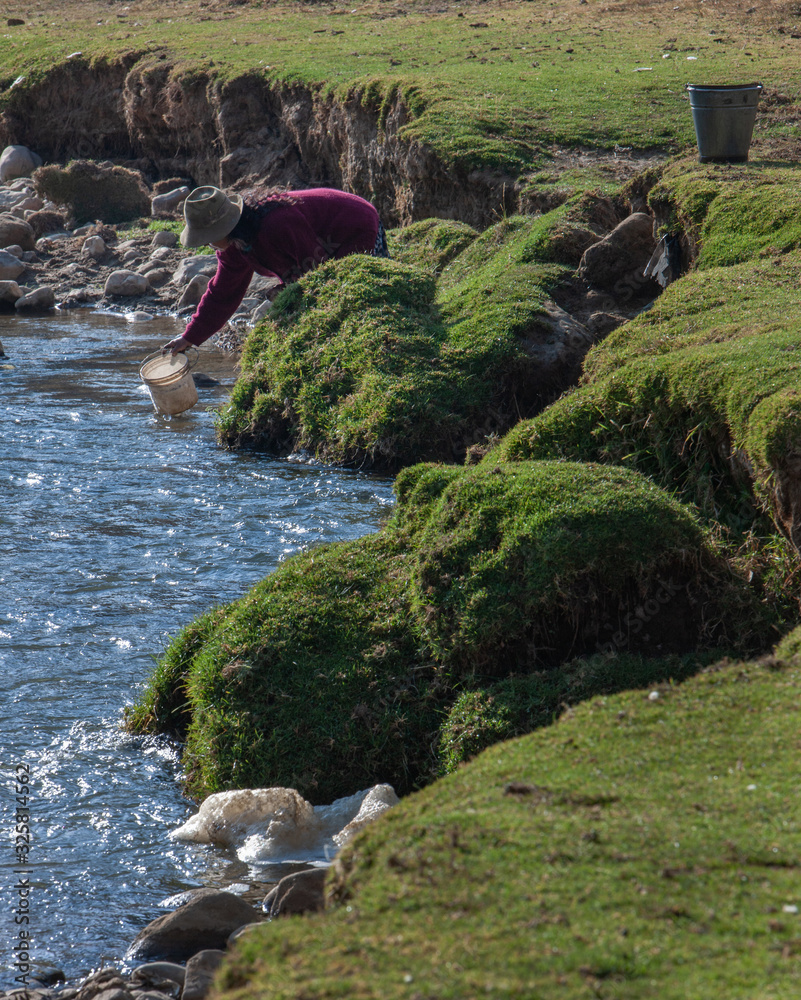 Indian woman. Fetching water from the river. Bucket. Indian. Valley of ...