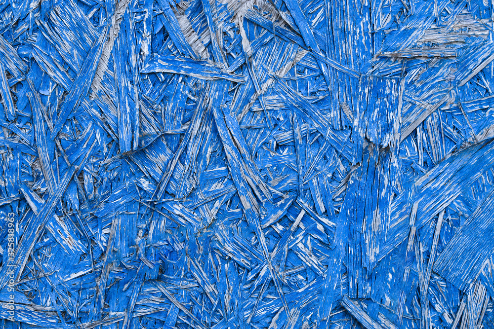 Blue abstract background with wooden texture. Painted OSB panel ...