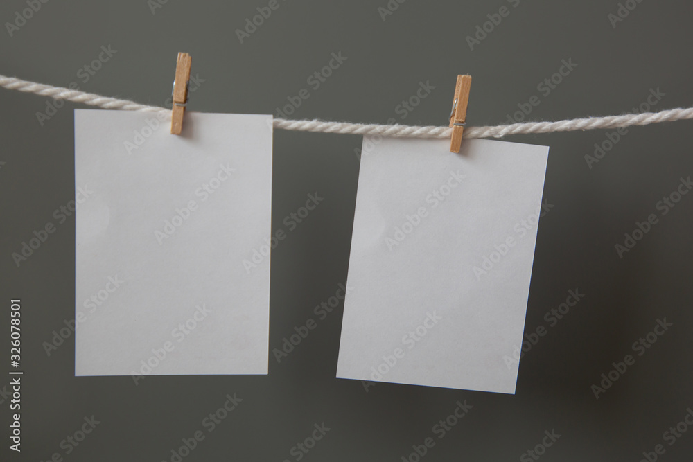 Blank white card hanging on the rope Stock Photo | Adobe Stock