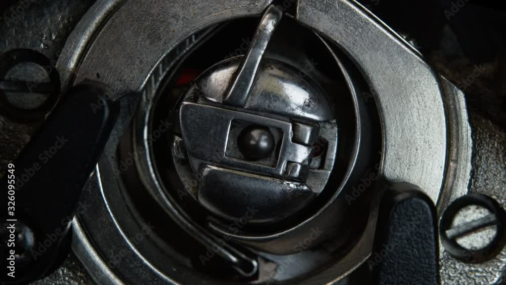 Internal parts of a sewing machine. The way the sewing machine works is ...