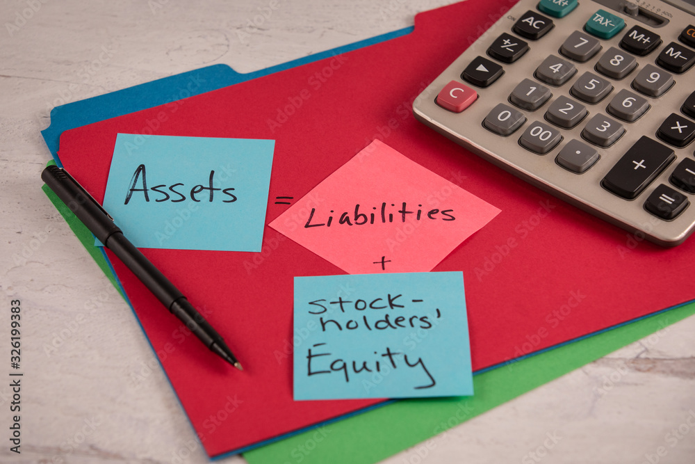 Foto de Assets equals liabilities plus stockholders equity notes on red ...
