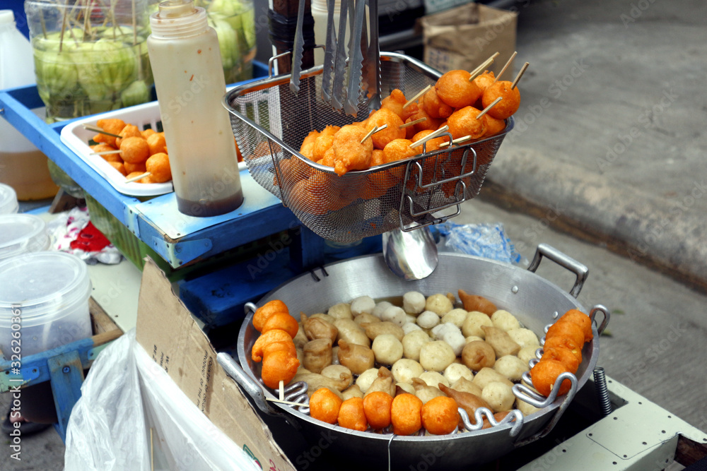 Filipino street food called Kwek Kwek or deep fried quail eggs Stock ...