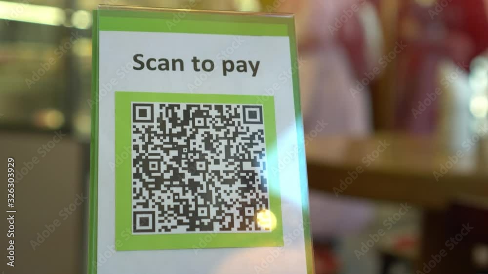 QR code payment display in the retail store. To use a QR code payment ...