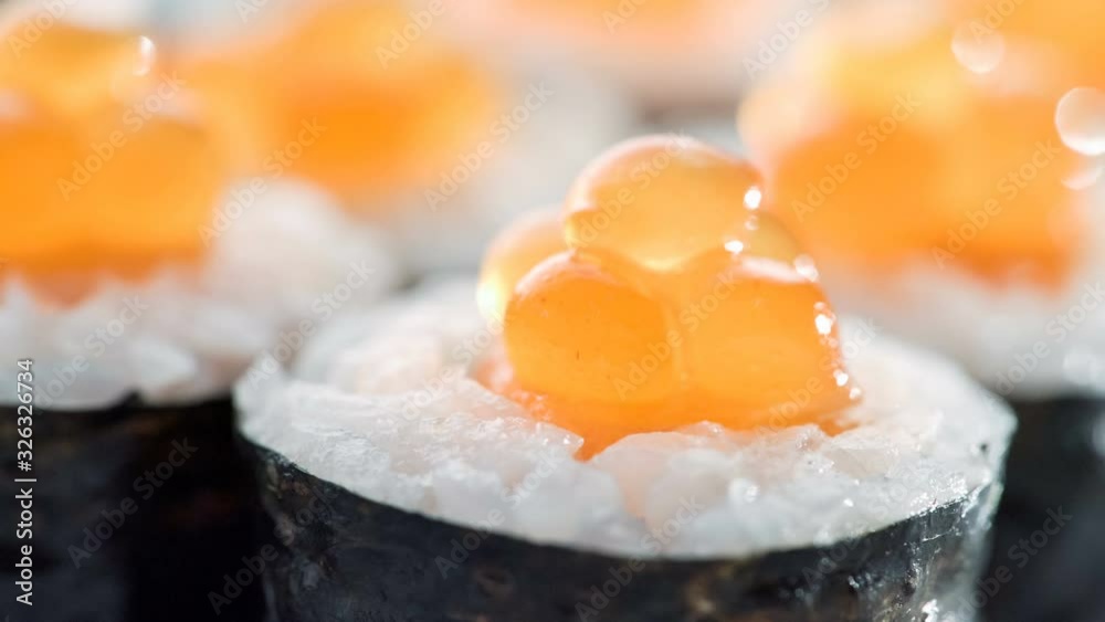 Fresh Sushi roll set rotating. Typical Japanese food, dish consisting ...