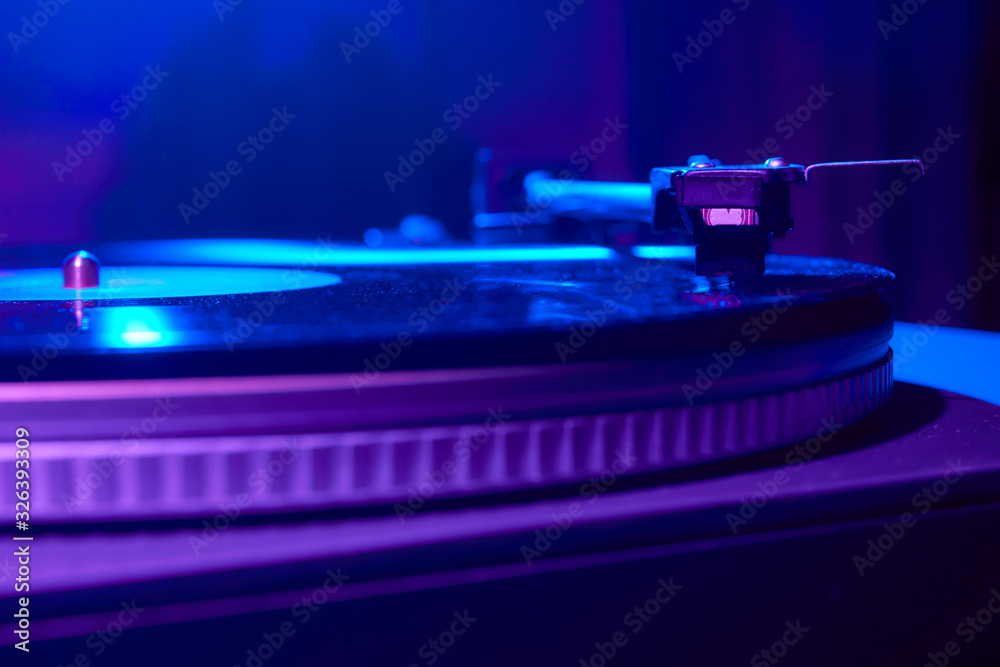 Retro wave, 80s. Record player with neon light. Vinyl analog turntable ...