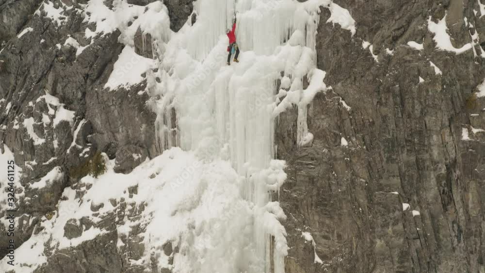 Astonishing aerial reveals two extreme climbers scaling frozen cliff ...