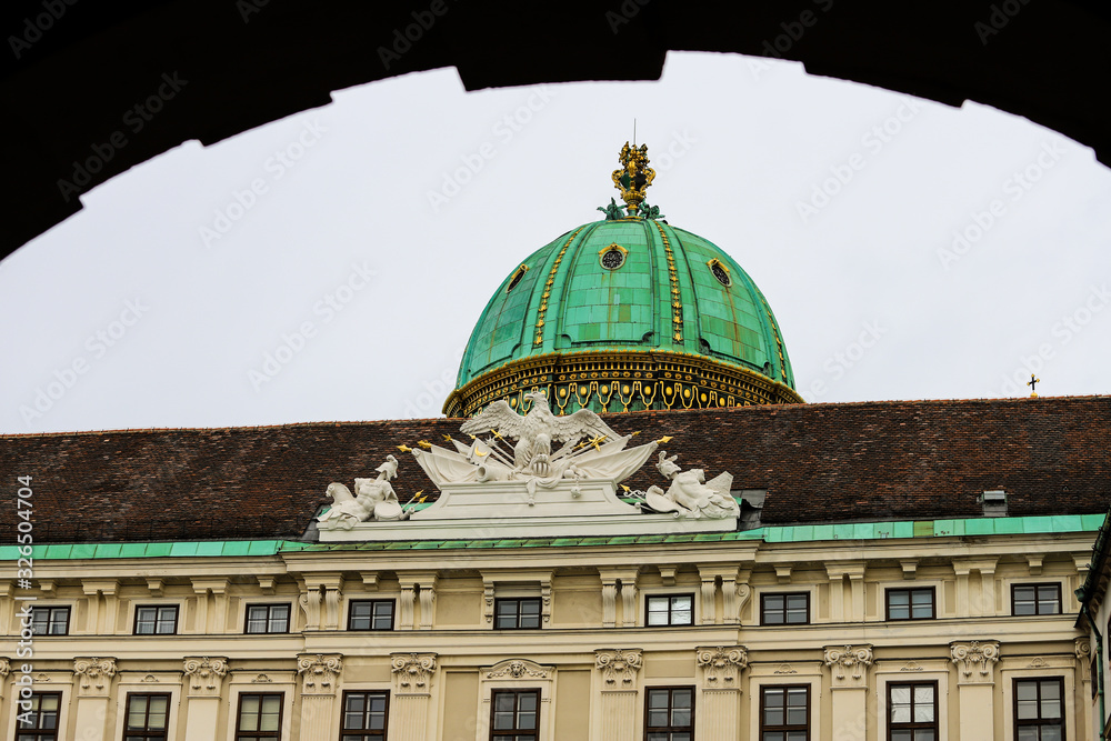 Nice green dome with gold details of a building with sculptures of ...