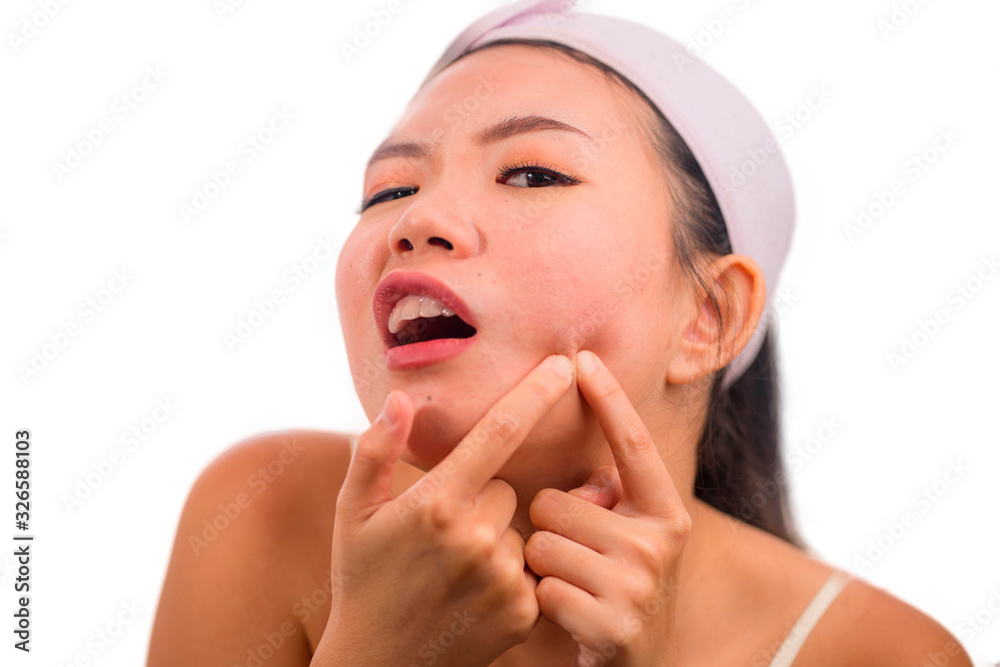 young beautiful angry and upset Asian Korean woman with acne pooping ...