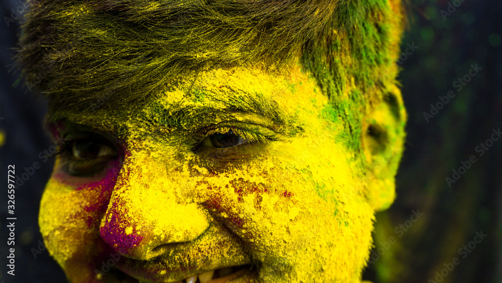 Young man celebrating holi with colors. holi is a festival of India. It ...