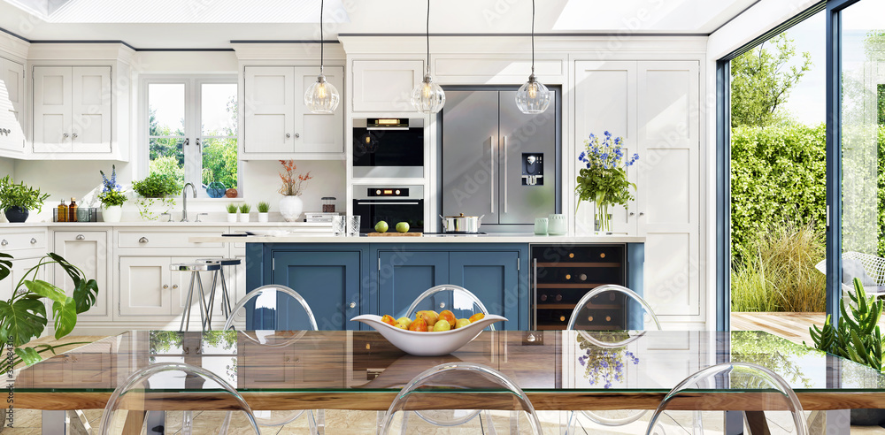 Open plan kitchen and diner to garden in modern terrace Stock Photo ...