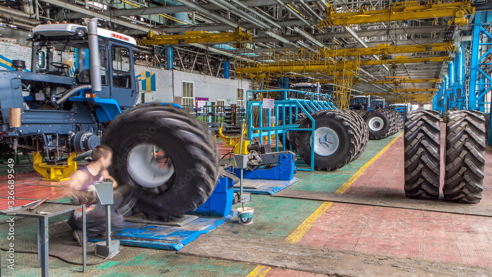 Professional mechanic install tire on wheel in repair service on ...