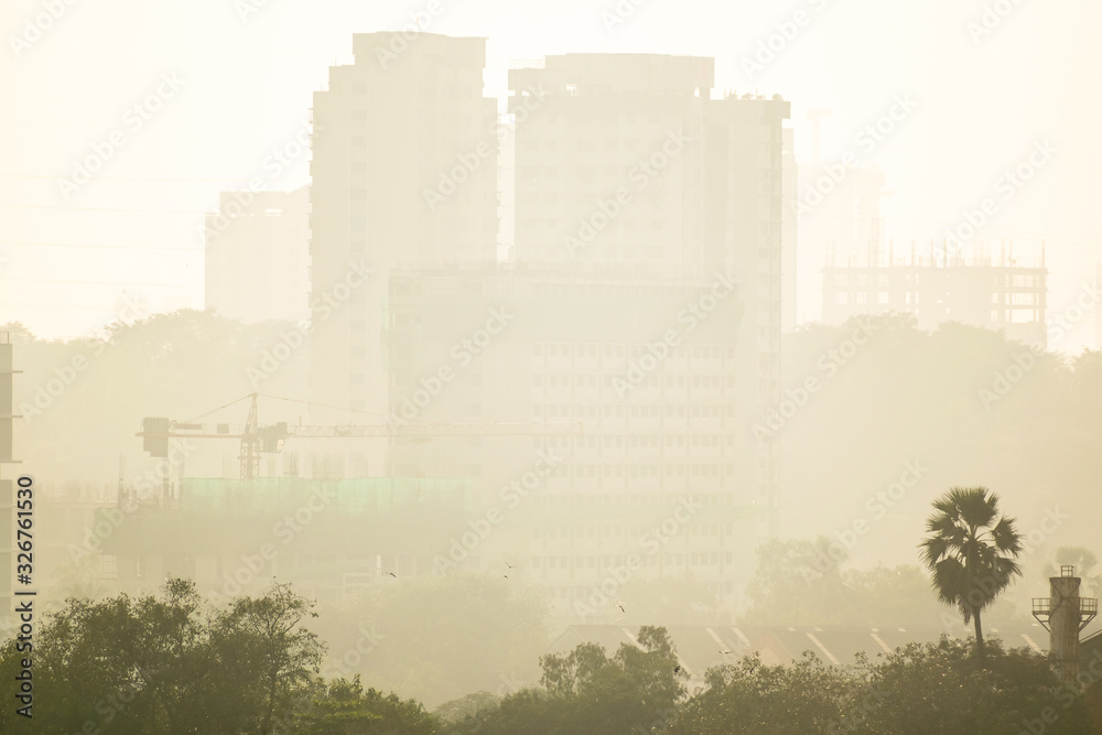 High rises shrouded in haze and smog of air pollution in the suburb of ...