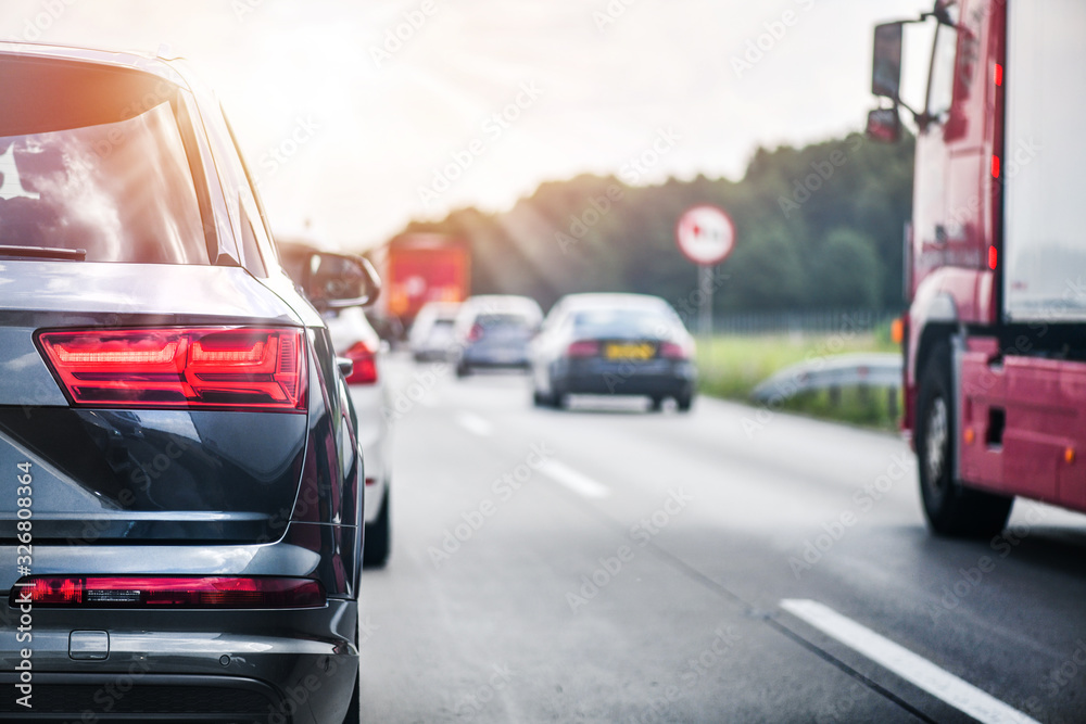 Car rush hours city street. Cars on highway in traffic jam Stock Photo ...