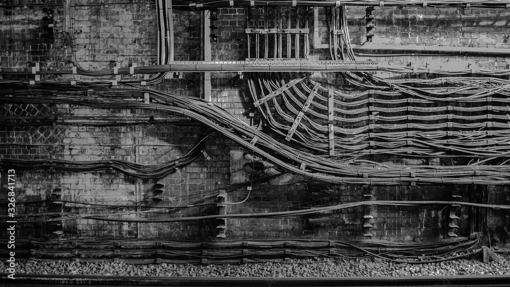 Industrial brick wall and pipes old textured grunge black and white ...